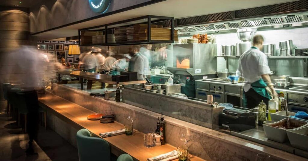 Exploring Open Kitchen Concepts in Restaurant Design | Carroll Design